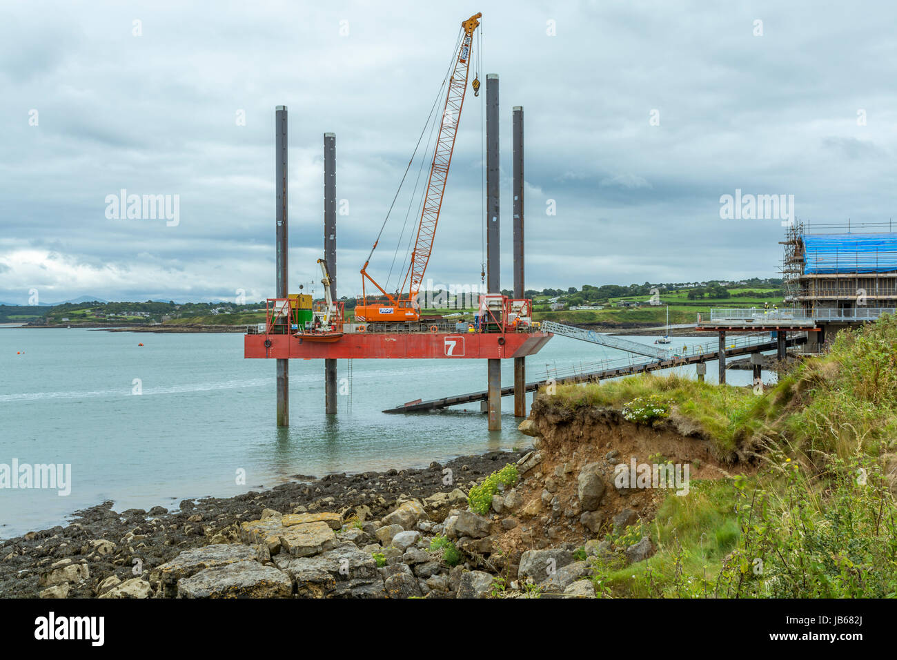 Construction of the new lifeboat house and slipway in progress, taken ...