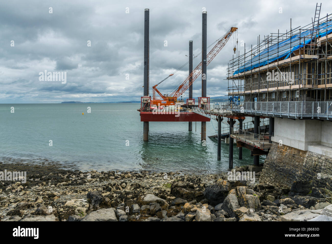 Construction of the new lifeboat house and slipway in progress, taken ...