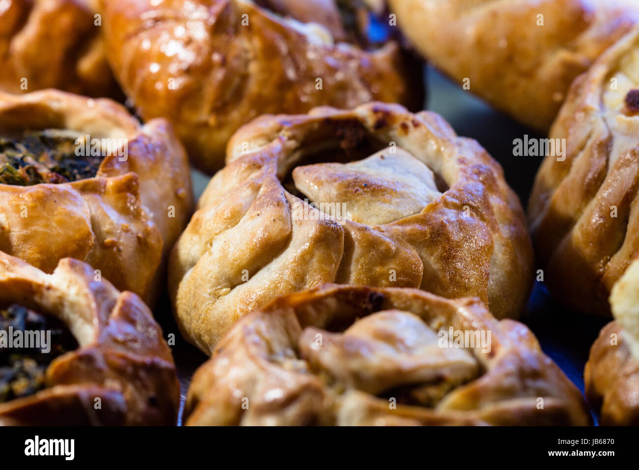 Typical street food from Malta. Pies with stuffing Stock Photo - Alamy