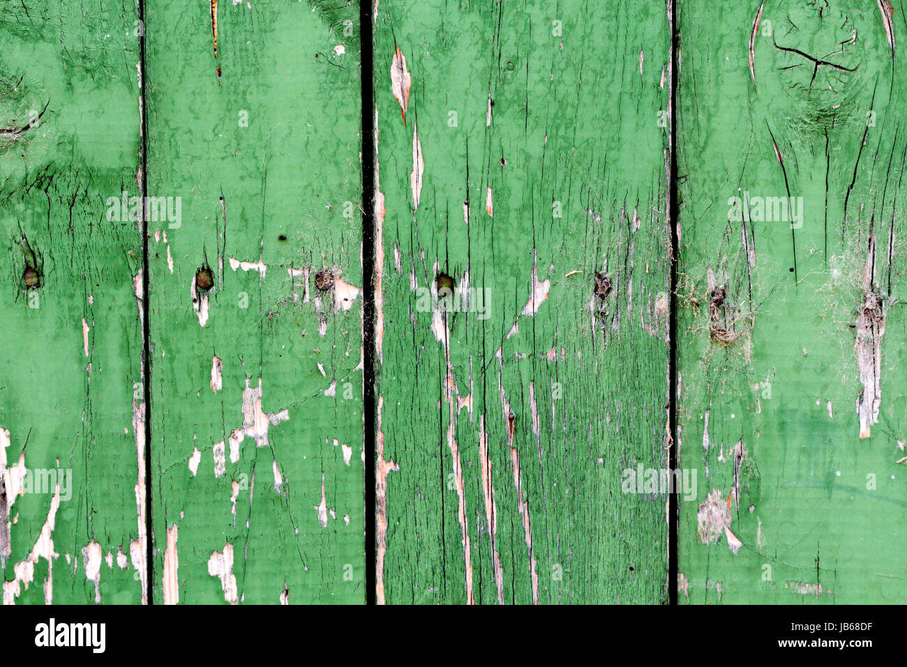 Picture of a Green old painted cracked wooden door texture as ...