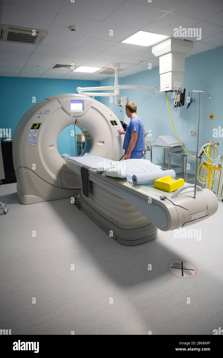 radiographer working on CT scanner in hospital Stock Photo - Alamy
