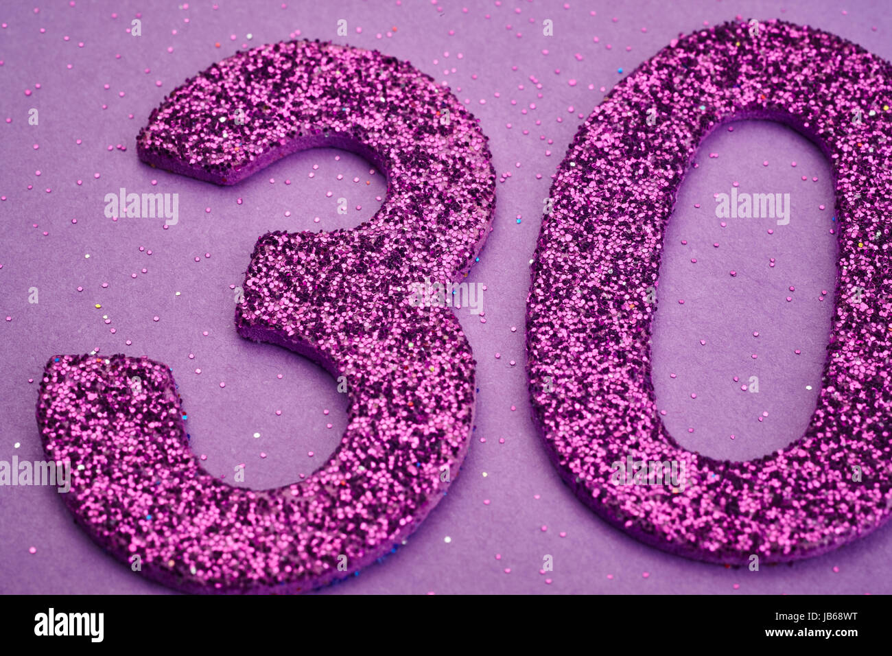 Number thirty purple color over a purple background. Anniversary ...