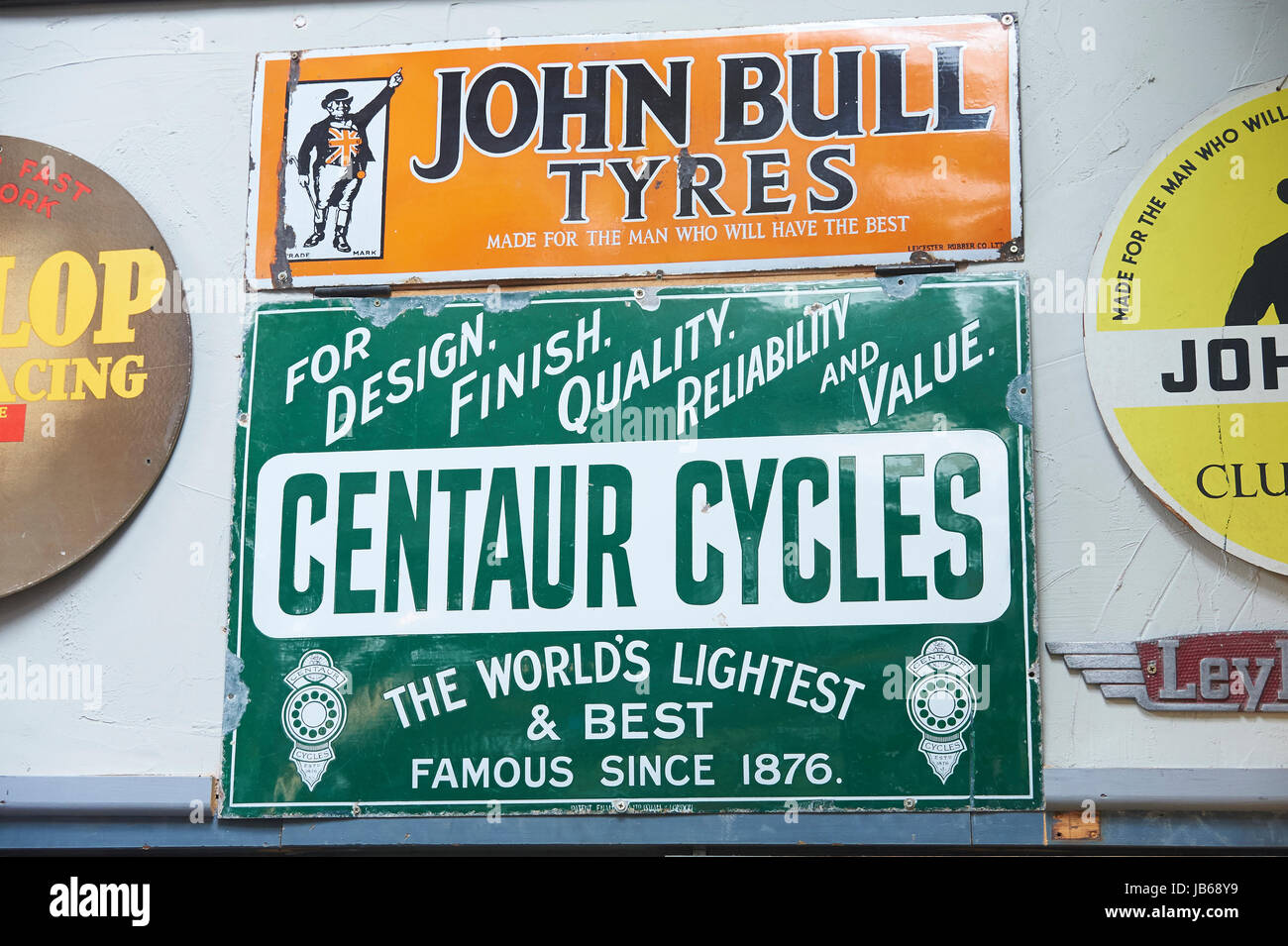 Old advertising signs for tyres Stock Photo - Alamy
