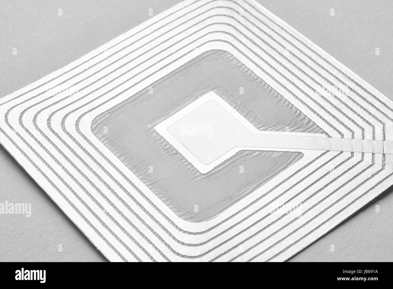 Metallic alarm device for objects. Macro detail. Horizontal Stock Photo ...