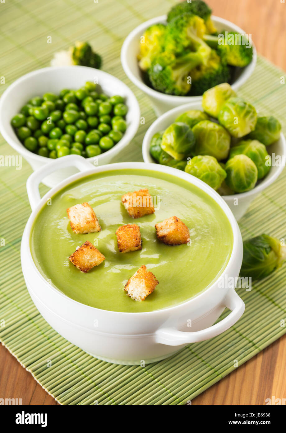 vegetable cream soup puree on wooden background Stock Photo - Alamy