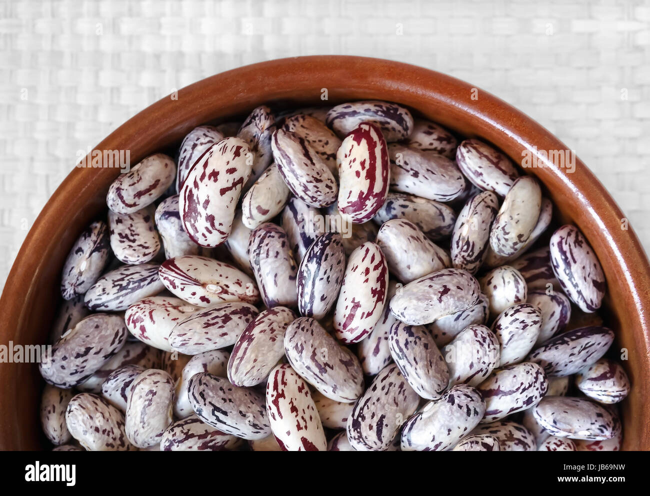 Bowl full of raw beans, on white background. View from above Stock ...