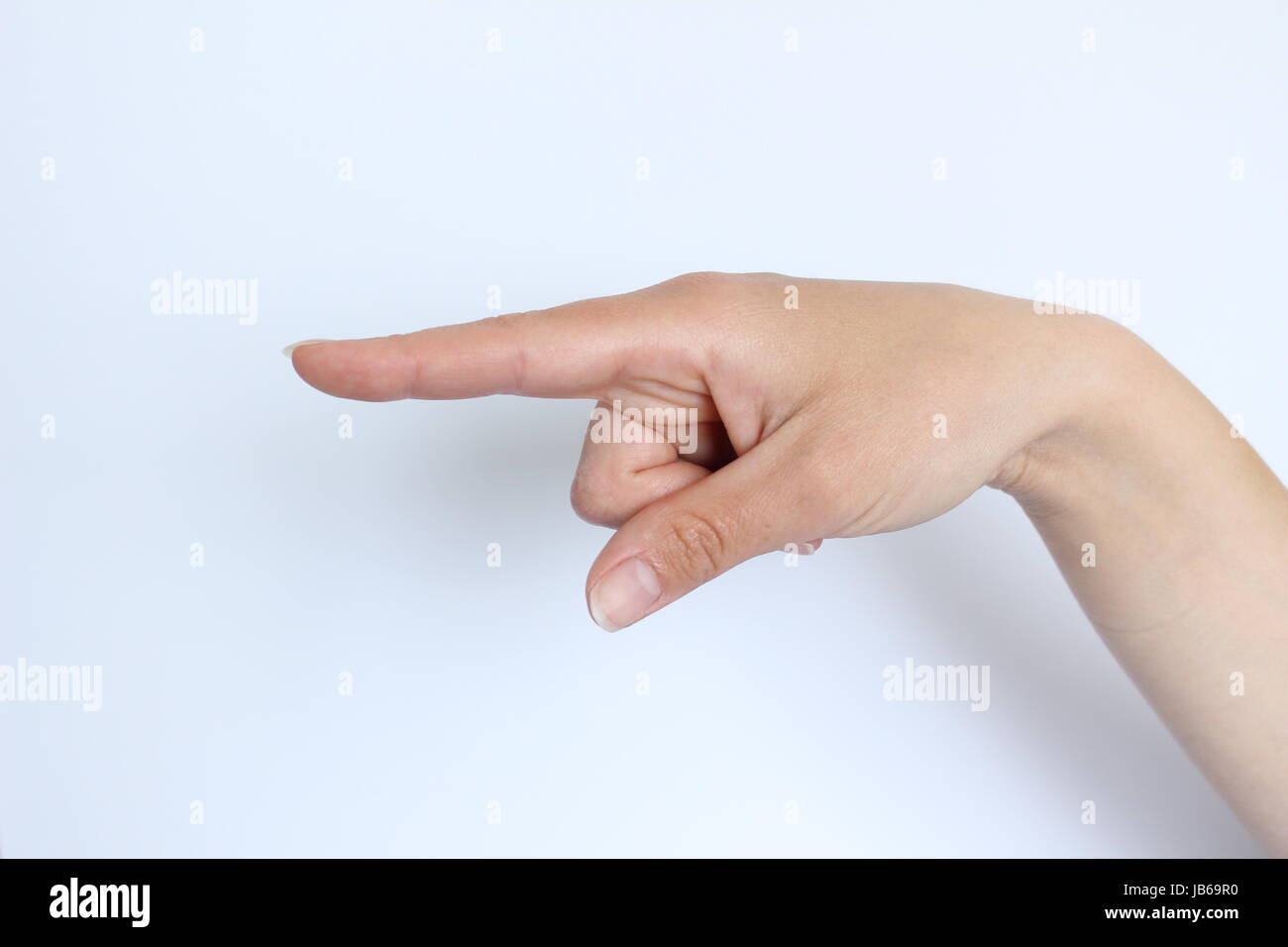 A hand pointing a direction or a thing on a white background Stock ...