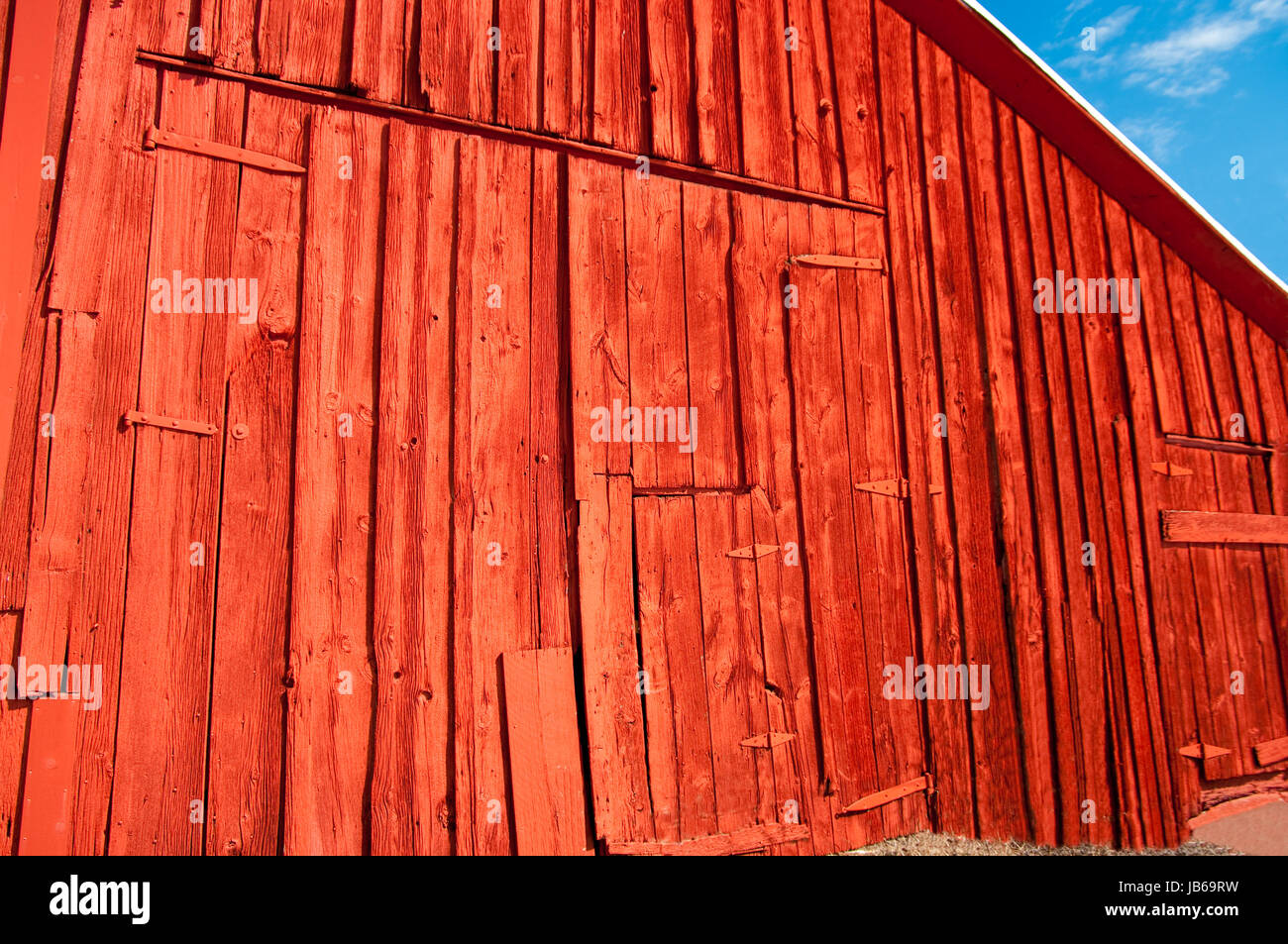 Old Barn with New Paint: Fresh red color brightens the side of a ...