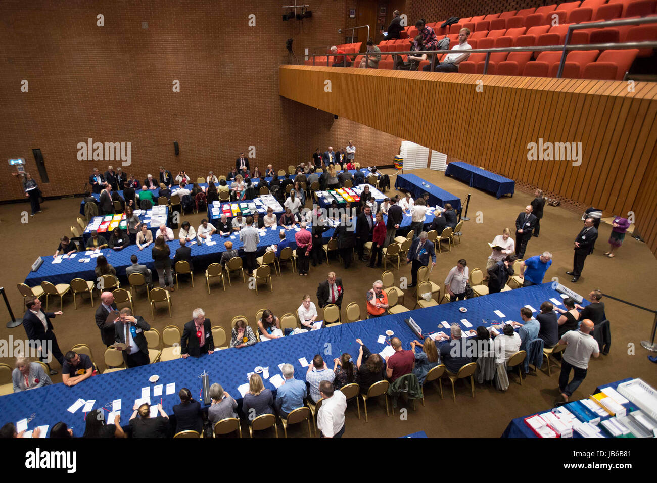 Election staff count ballot papers as a third General Election count ...