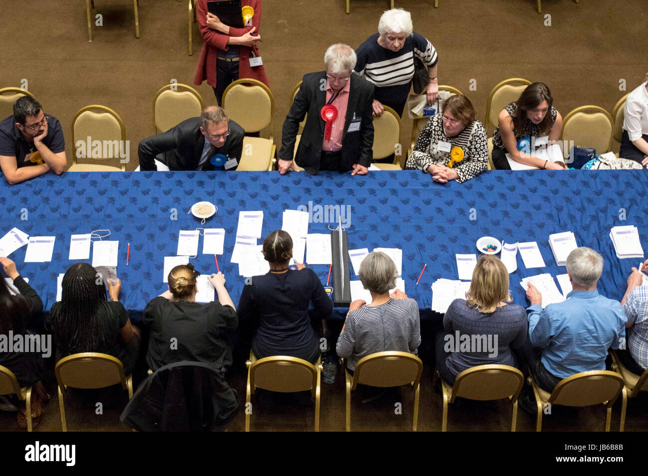 Election staff count ballot papers as a third General Election count ...