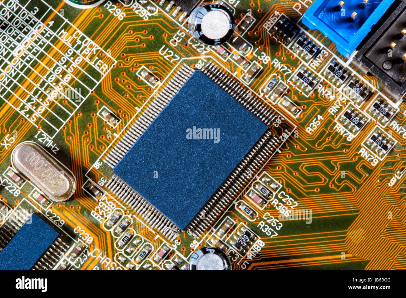Micro chip and mother board Stock Photo - Alamy