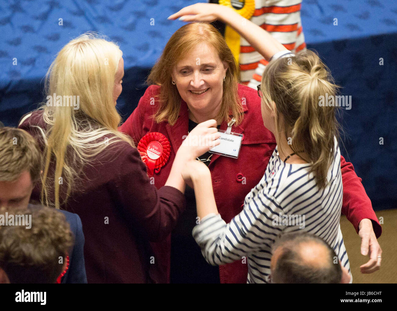 Labour's Emma Dent Coad (wearing rosette) is congratulated after she ...