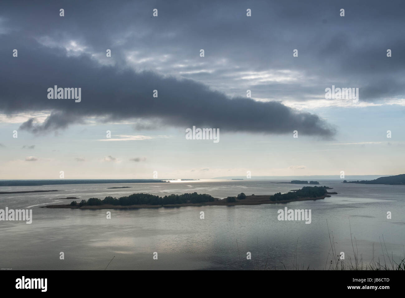 Approaching bad weather. Rain clouds over the river Stock Photo - Alamy