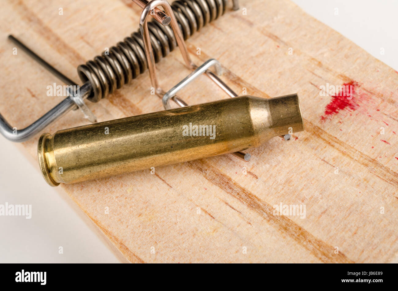 Bullet shell on a mousetrap, a gun violence concept Stock Photo - Alamy