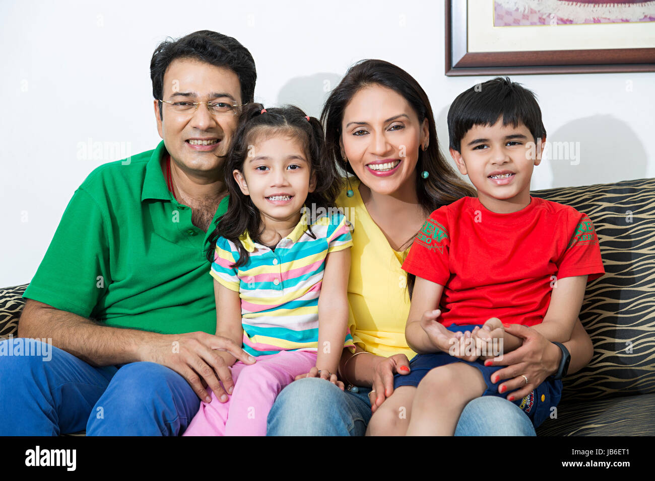 4 People At Home Boy Father Girl Kids Mother Parents Sitting Smiling ...