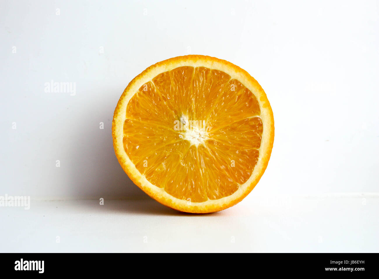 Orange sliced one slice. Photo for your design Stock Photo - Alamy