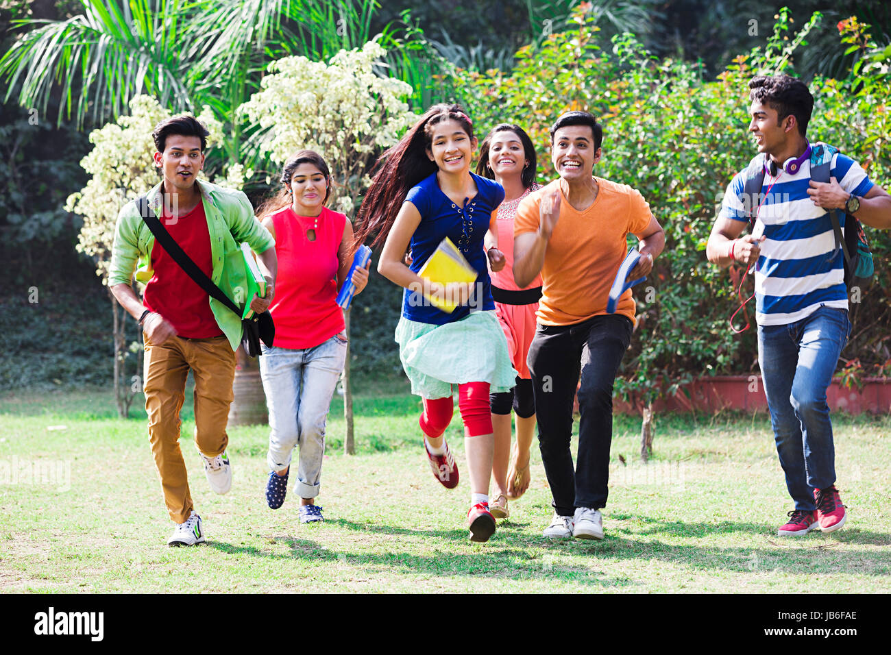 Group College Students Friends Running Together In Park having Fun ...