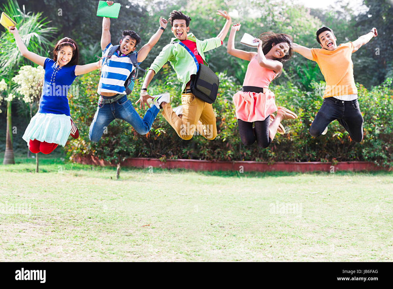 Group jumping park hi-res stock photography and images - Alamy