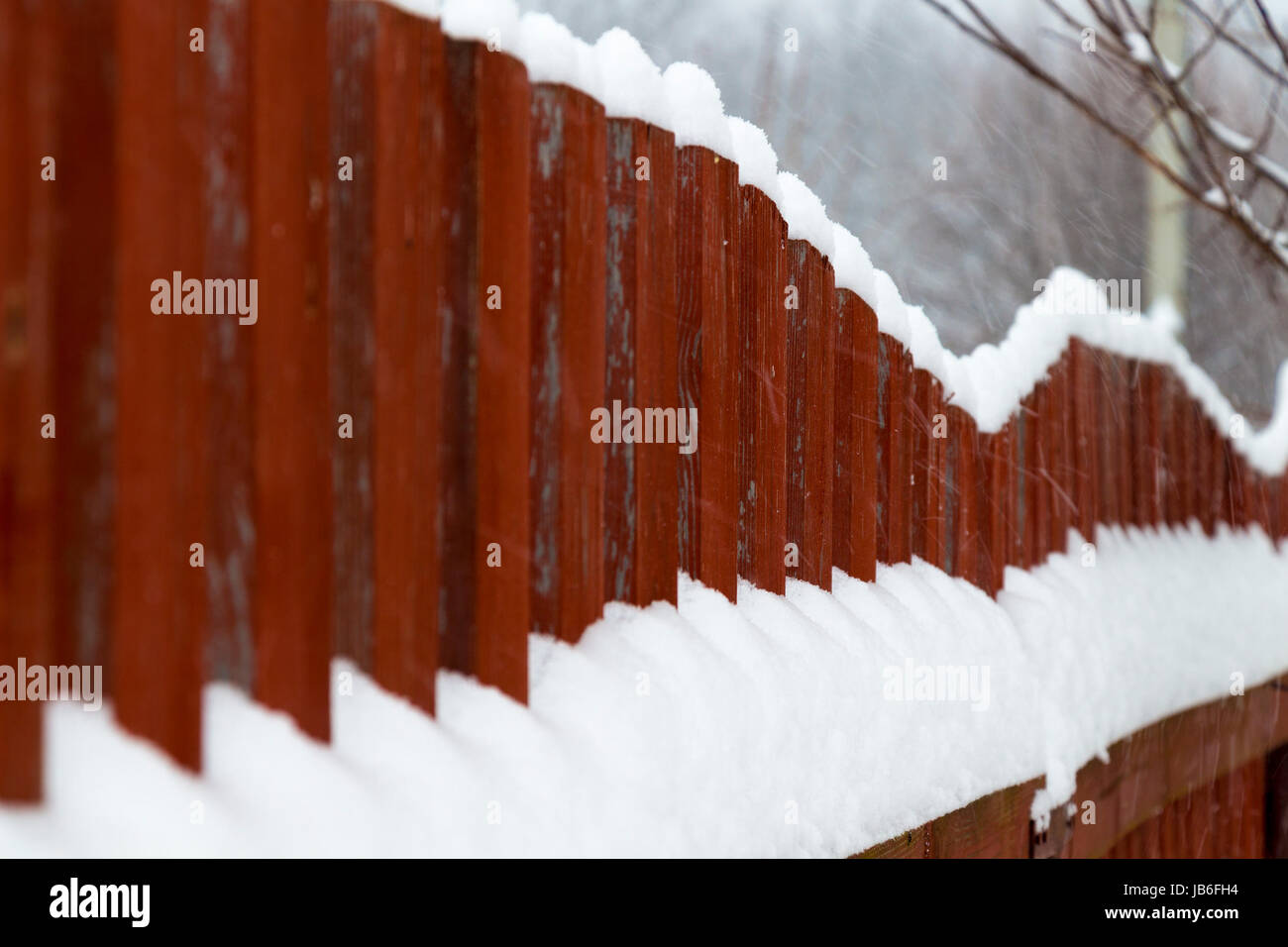 Red wooden fence closeup Stock Photo - Alamy