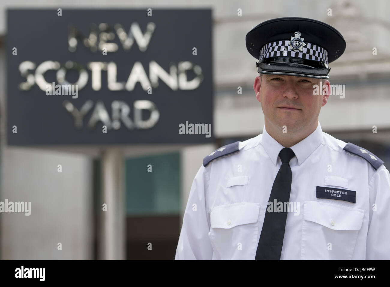 Metropolitan Police Inspector Jim Cole at New Scotland Yard, London ...