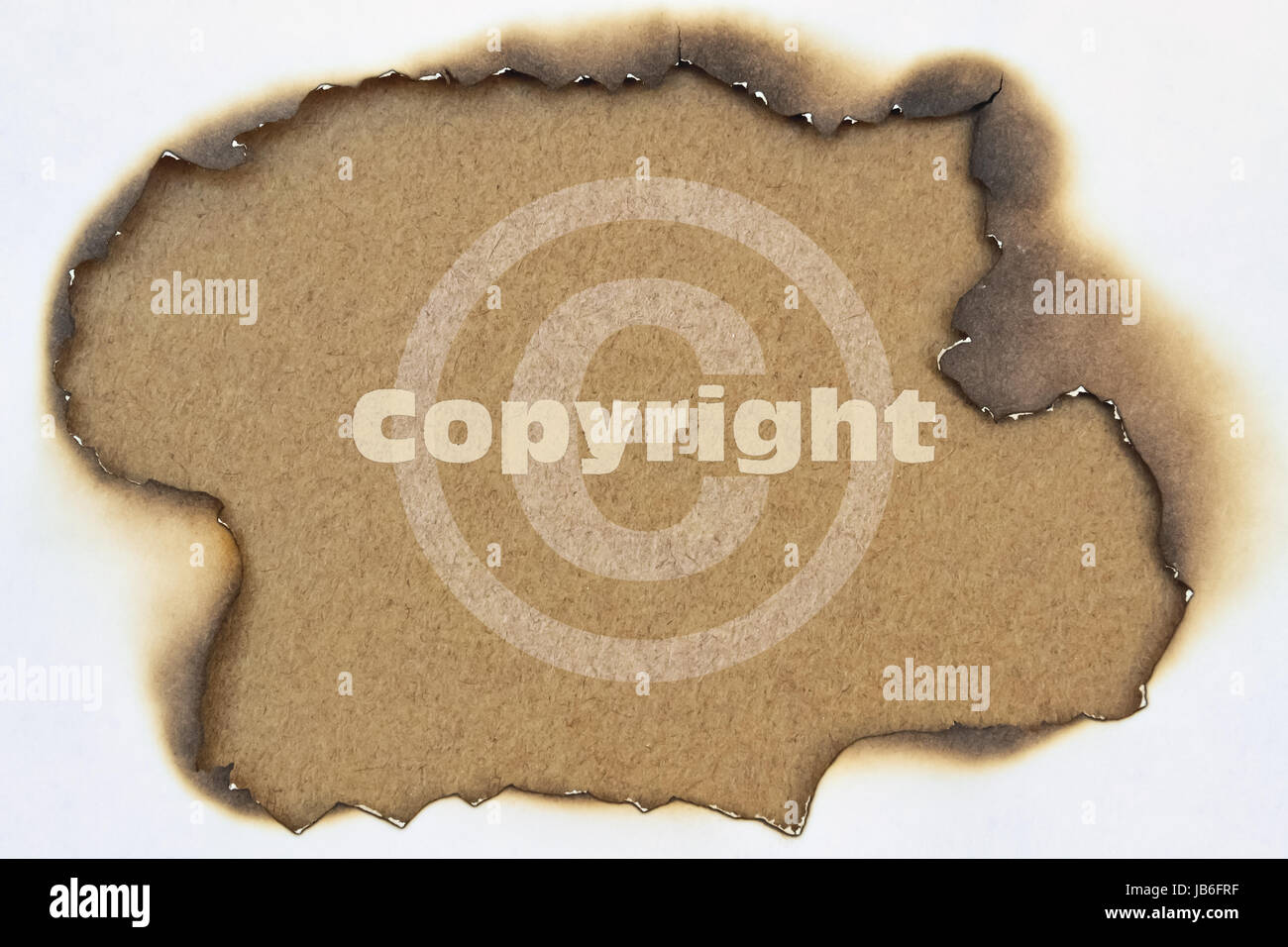 Copyright symbol and word Copyright written on burnt paper Stock Photo ...