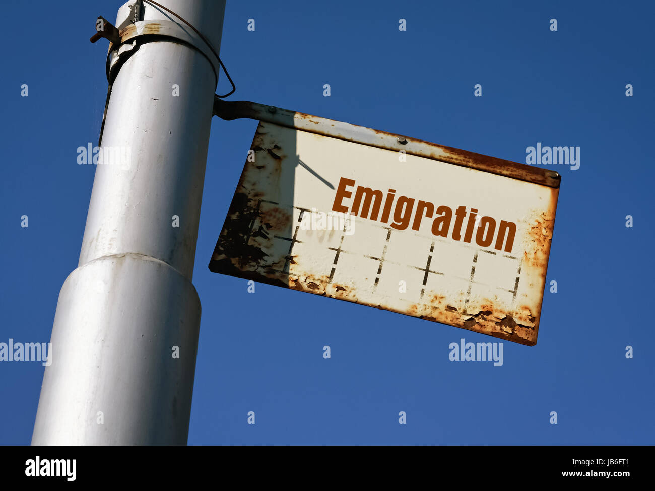 Word Emigration written on a white metal board Stock Photo - Alamy