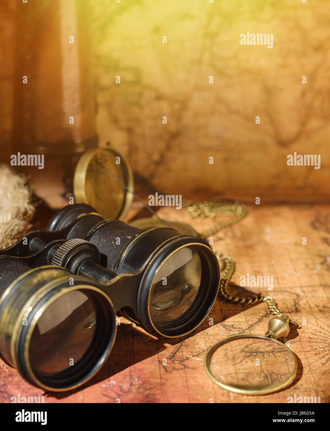 Ancient world map with a variety of accessories. Vintage still life ...