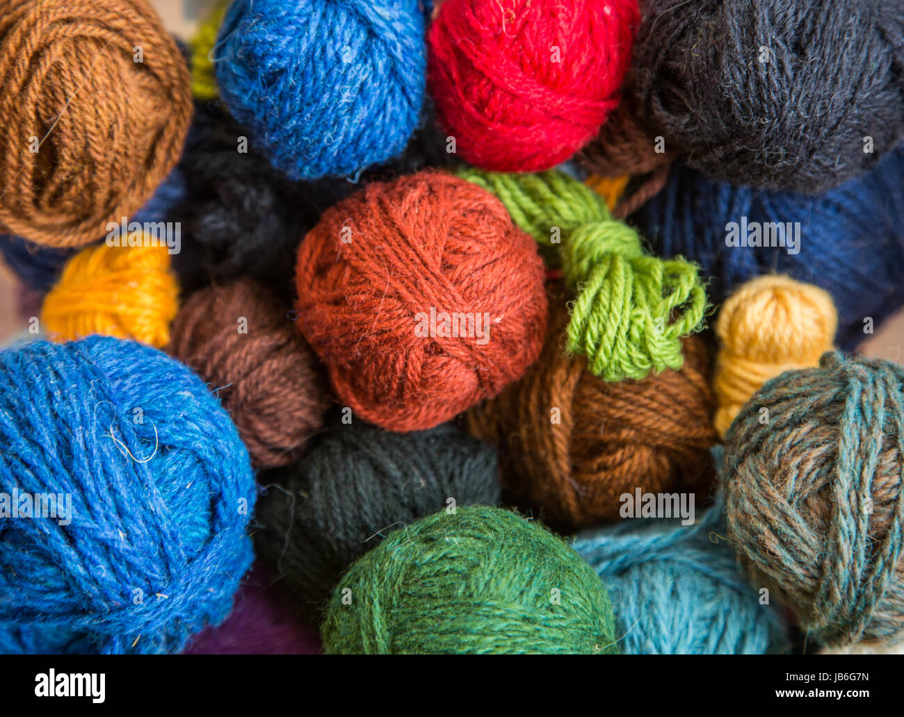 A beautiful lot of colorful yarn balls Stock Photo - Alamy