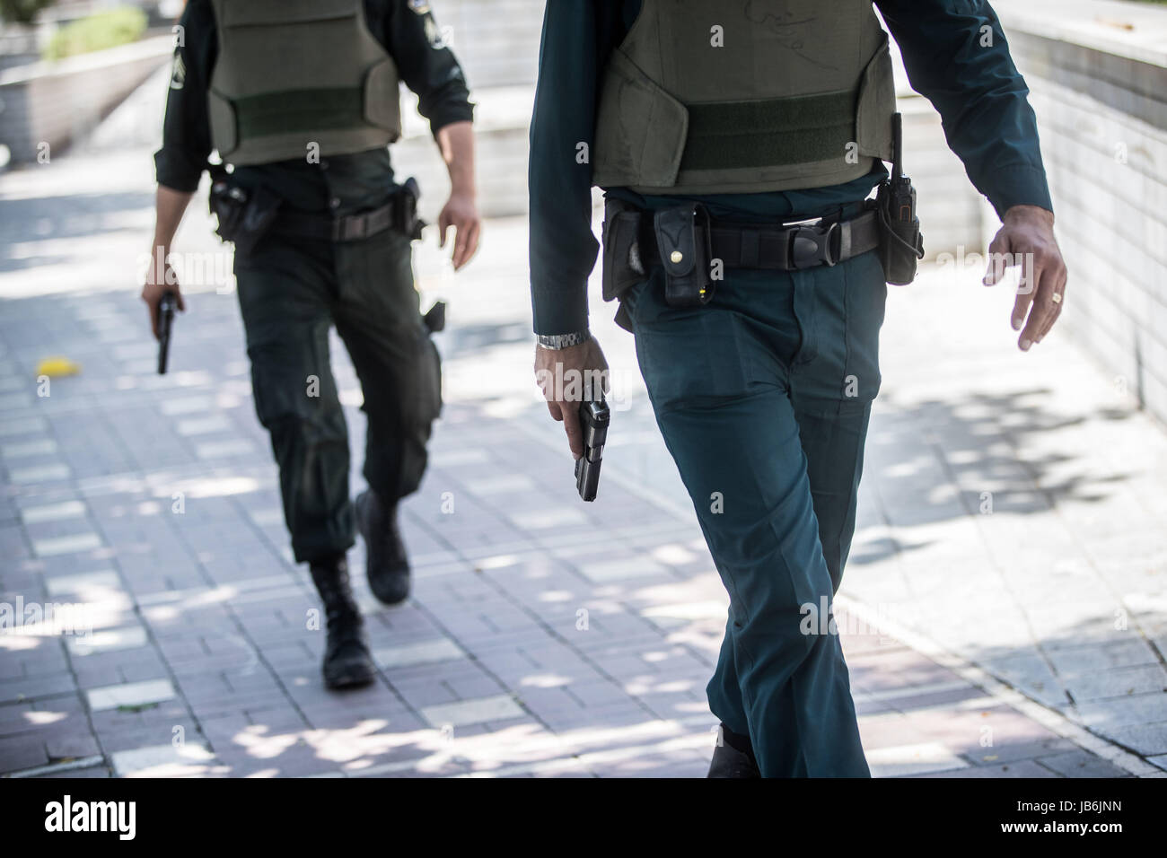 Tehran, Iran. 7th June, 2017. Iranian police officers conduct an ...