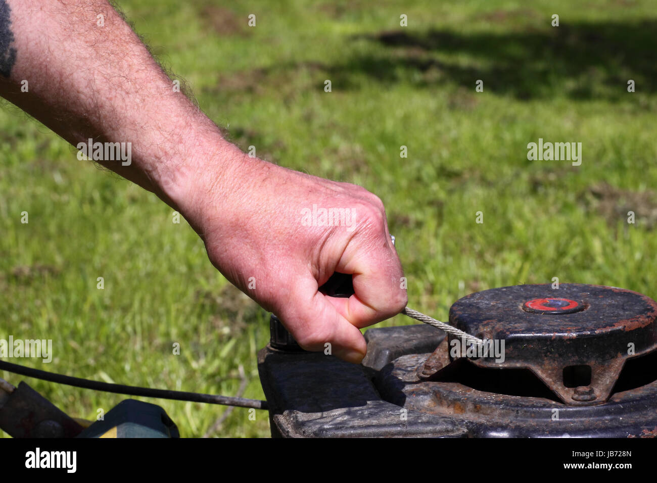 starting a lawn mower Stock Photo - Alamy