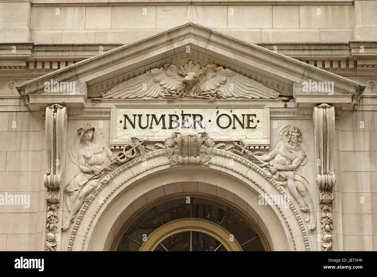 The facade of the building with the inscription NUMBER ONE above the ...
