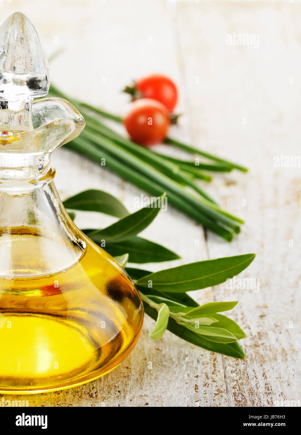Olive Oil ,Tomatoes And Green Onion Stock Photo - Alamy