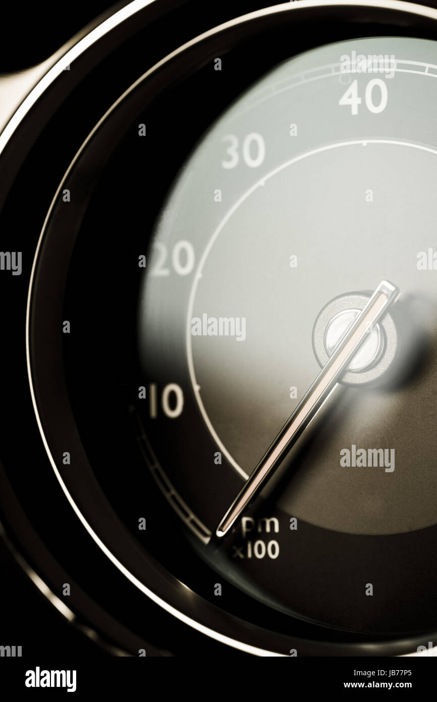 Detail of a tachometer in a car Stock Photo - Alamy