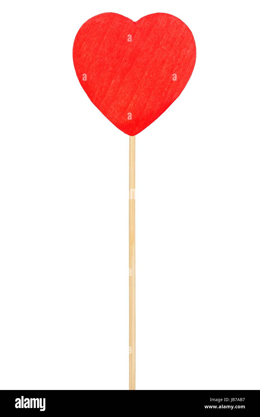 Red wooden heart on stick isolated on white background Stock Photo - Alamy