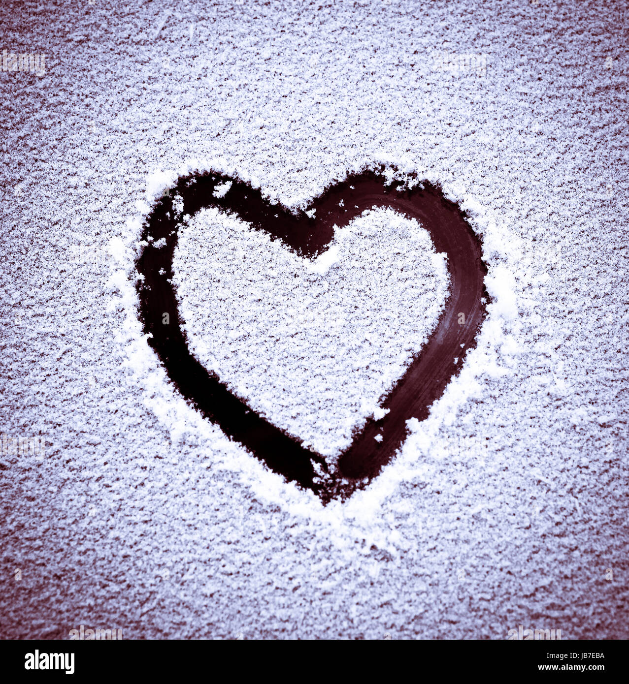 Picture of a heart drawing in the snow Stock Photo - Alamy