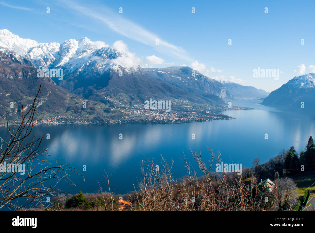 picturesque landscape with the blue water of Lake Como surrounded by ...