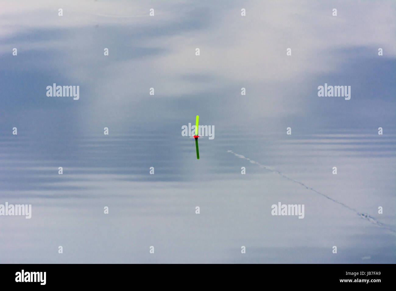 Float for fishing on the water. Catch of fish. Angling background Stock ...