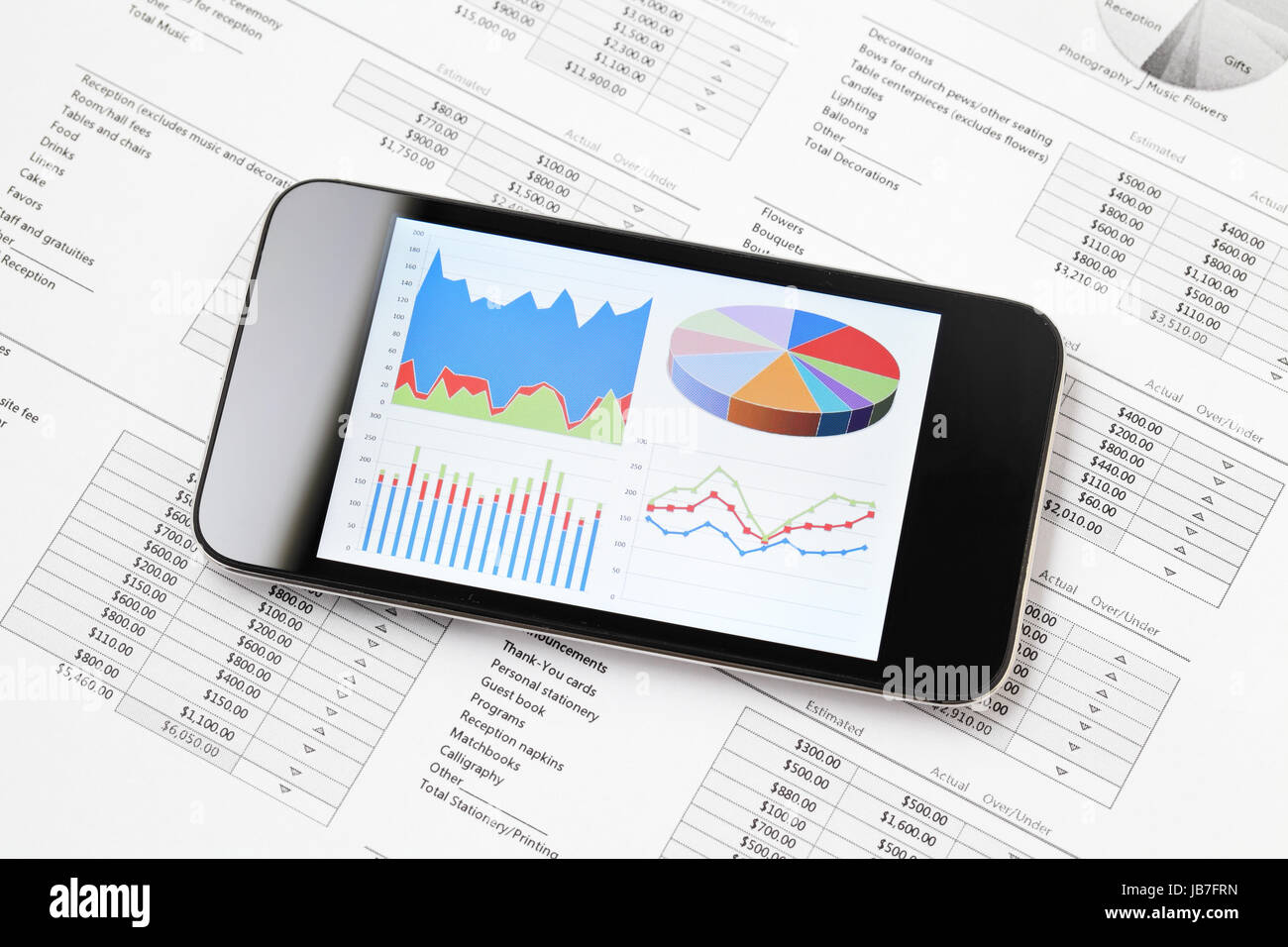 Graphical chart on mobile Stock Photo - Alamy