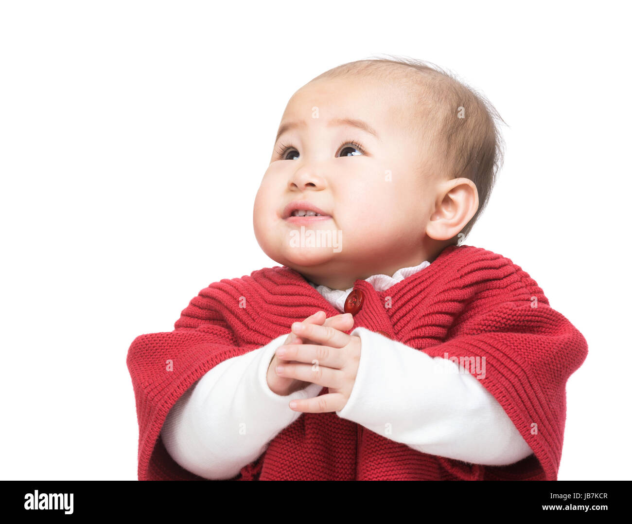 Baby girl making wish Stock Photo - Alamy