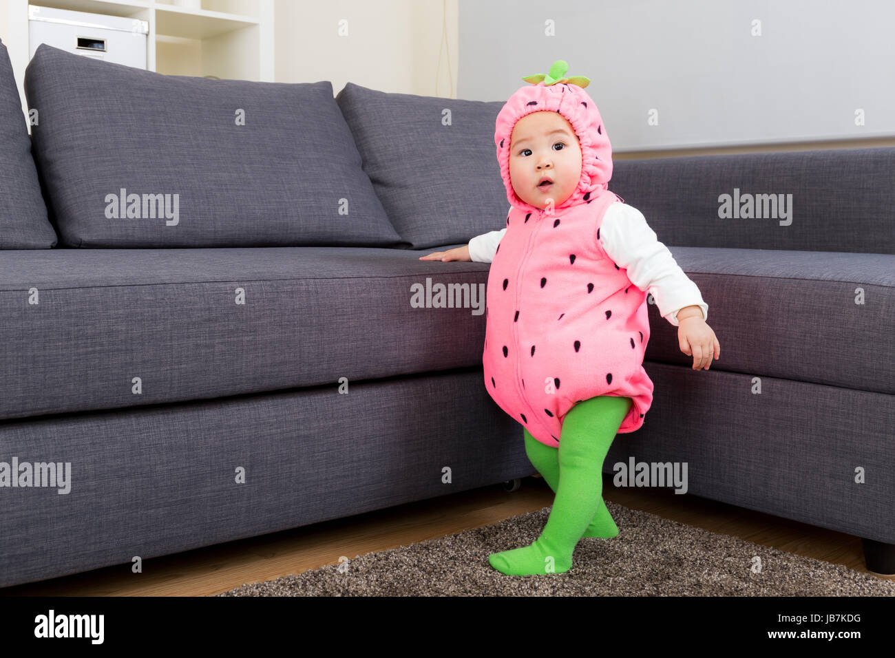 Asia baby with strawberry costume in halloween party Stock Photo - Alamy