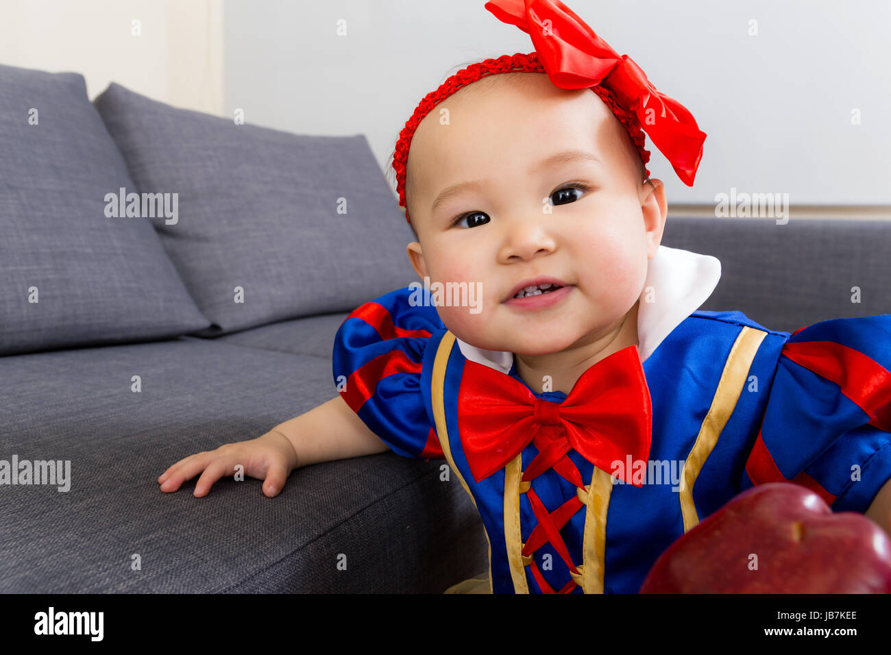 Baby girl want apple Stock Photo - Alamy