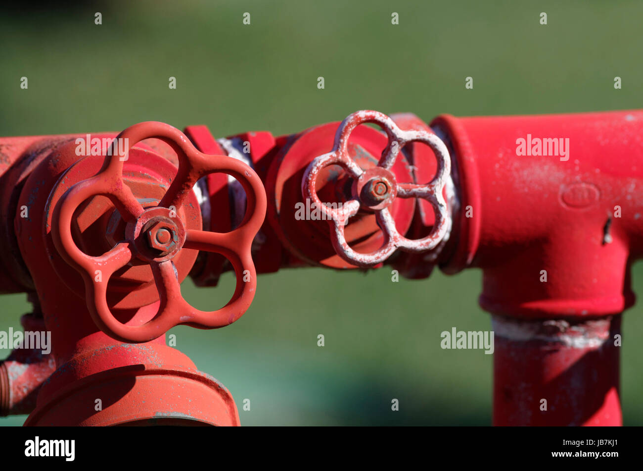 red metallic fire hydrant in a harbour in la spezia Stock Photo - Alamy