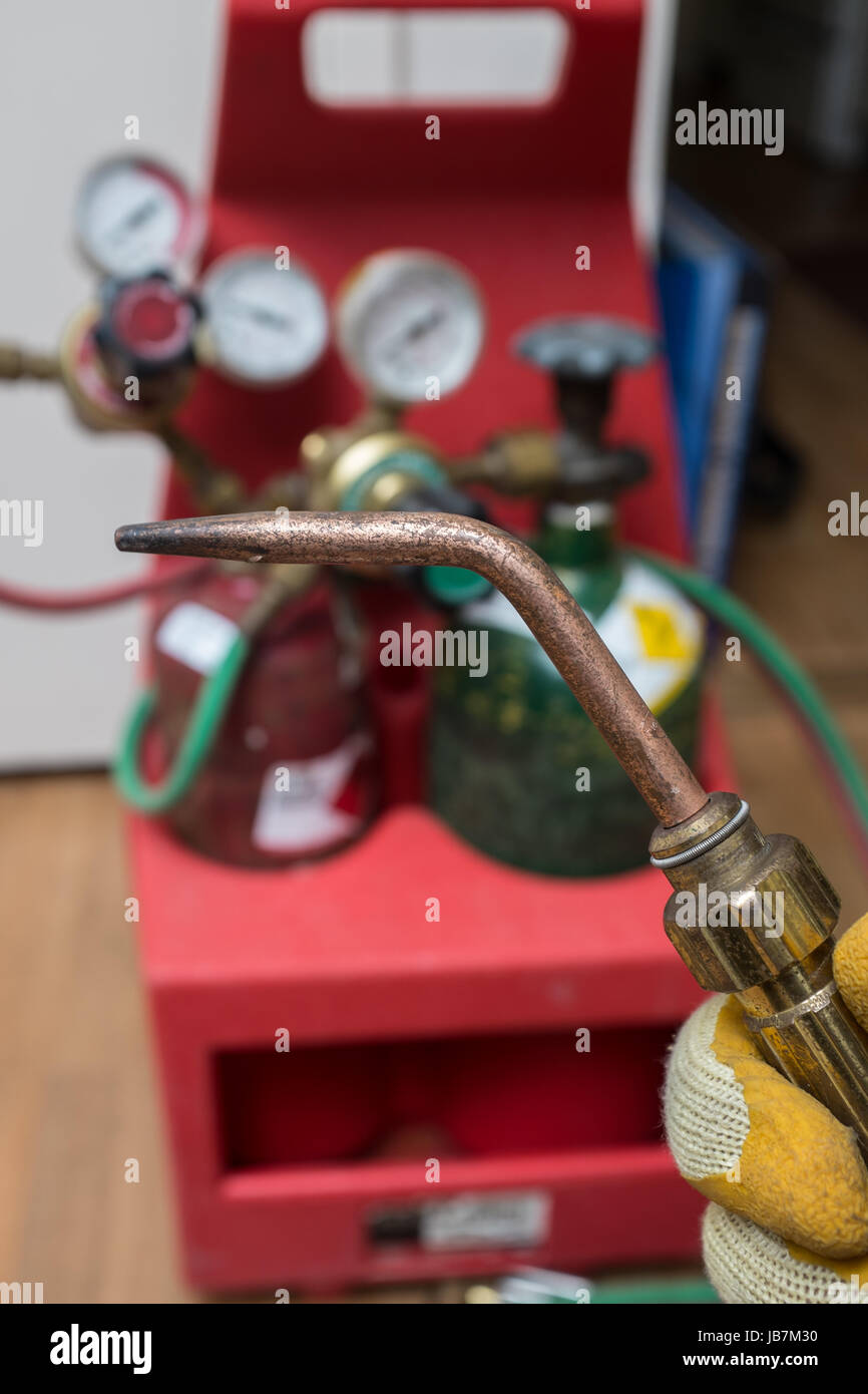 Handyman repairman HVAC tools Stock Photo - Alamy