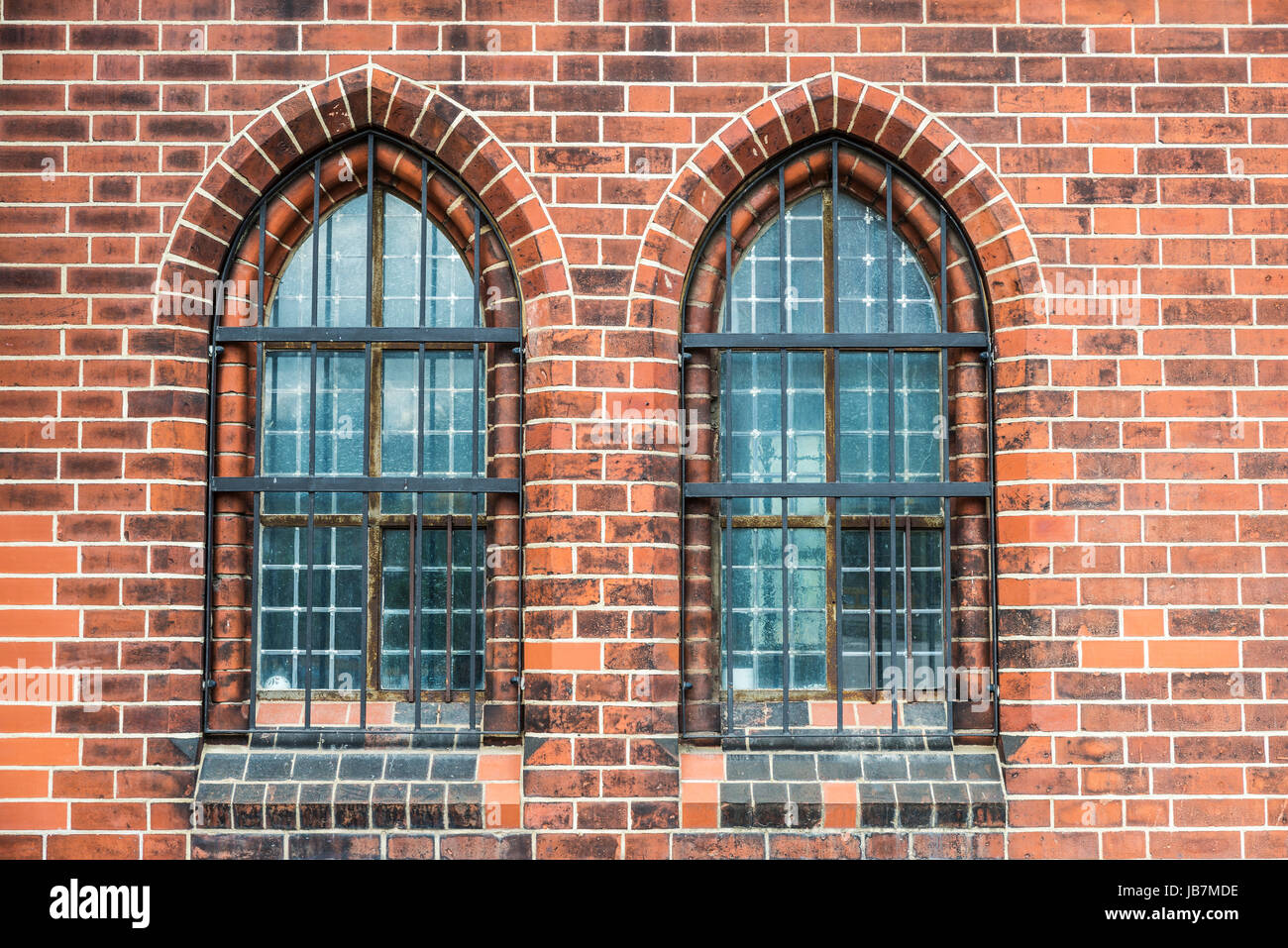 Wall with two gothic style windows in St Mary church (Marienkirche ...
