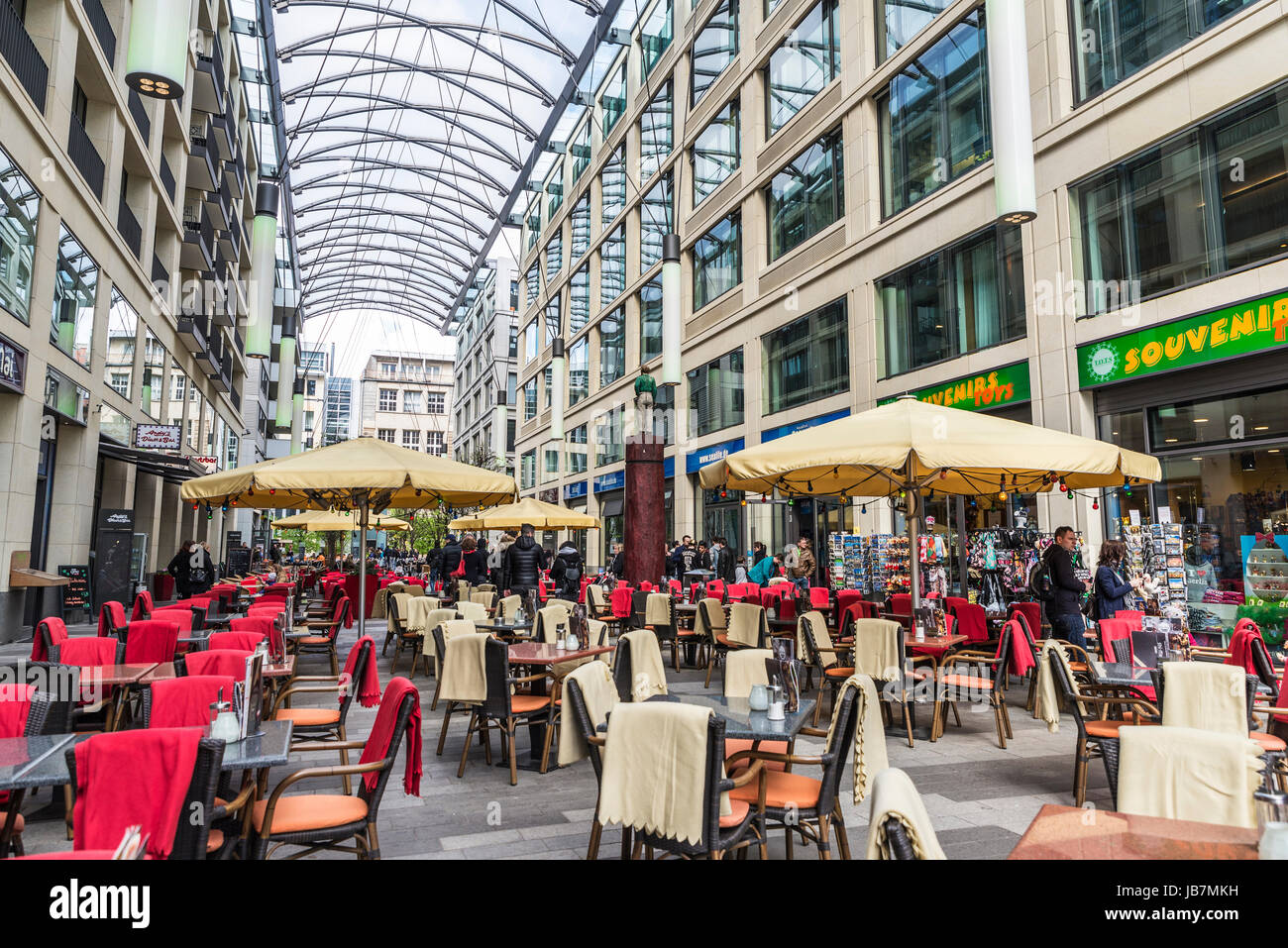Berlin, Germany - April 13, 2017: Shopping center with shops, bars and ...