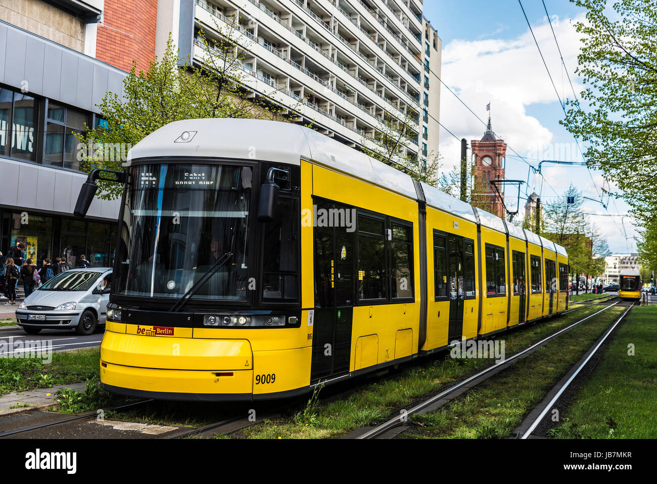 Berlin, Germany - April 13, 2017: Yellow tram circulating on a grassy ...