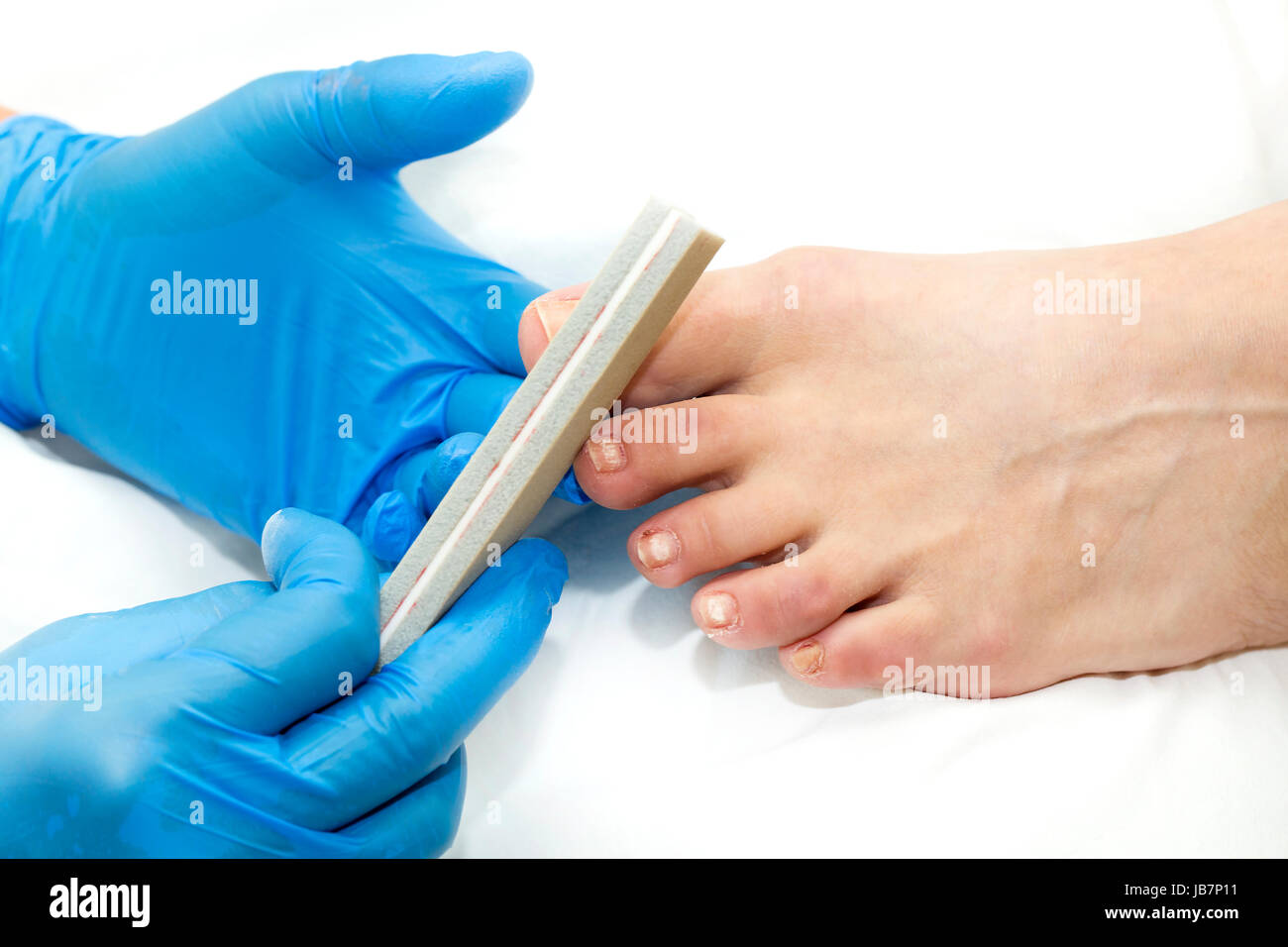 Process of pedicure at beauty salon Stock Photo - Alamy