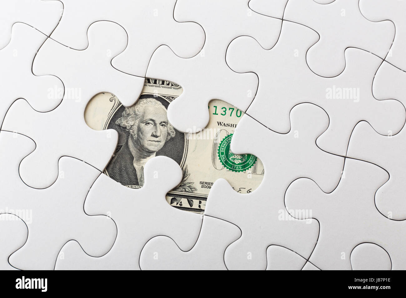 US dollar banknote and puzzle Stock Photo - Alamy