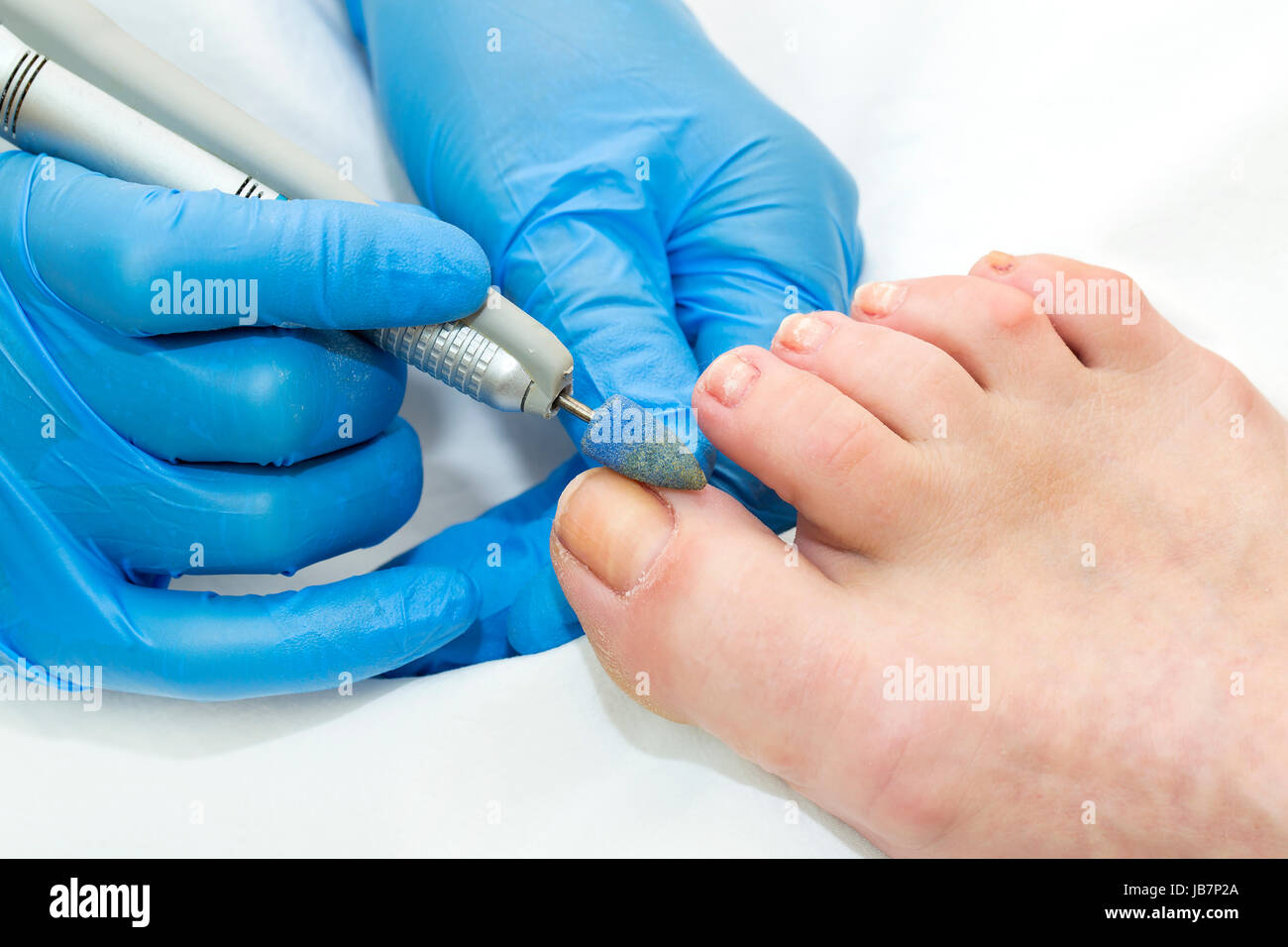 Process of pedicure at beauty salon Stock Photo - Alamy