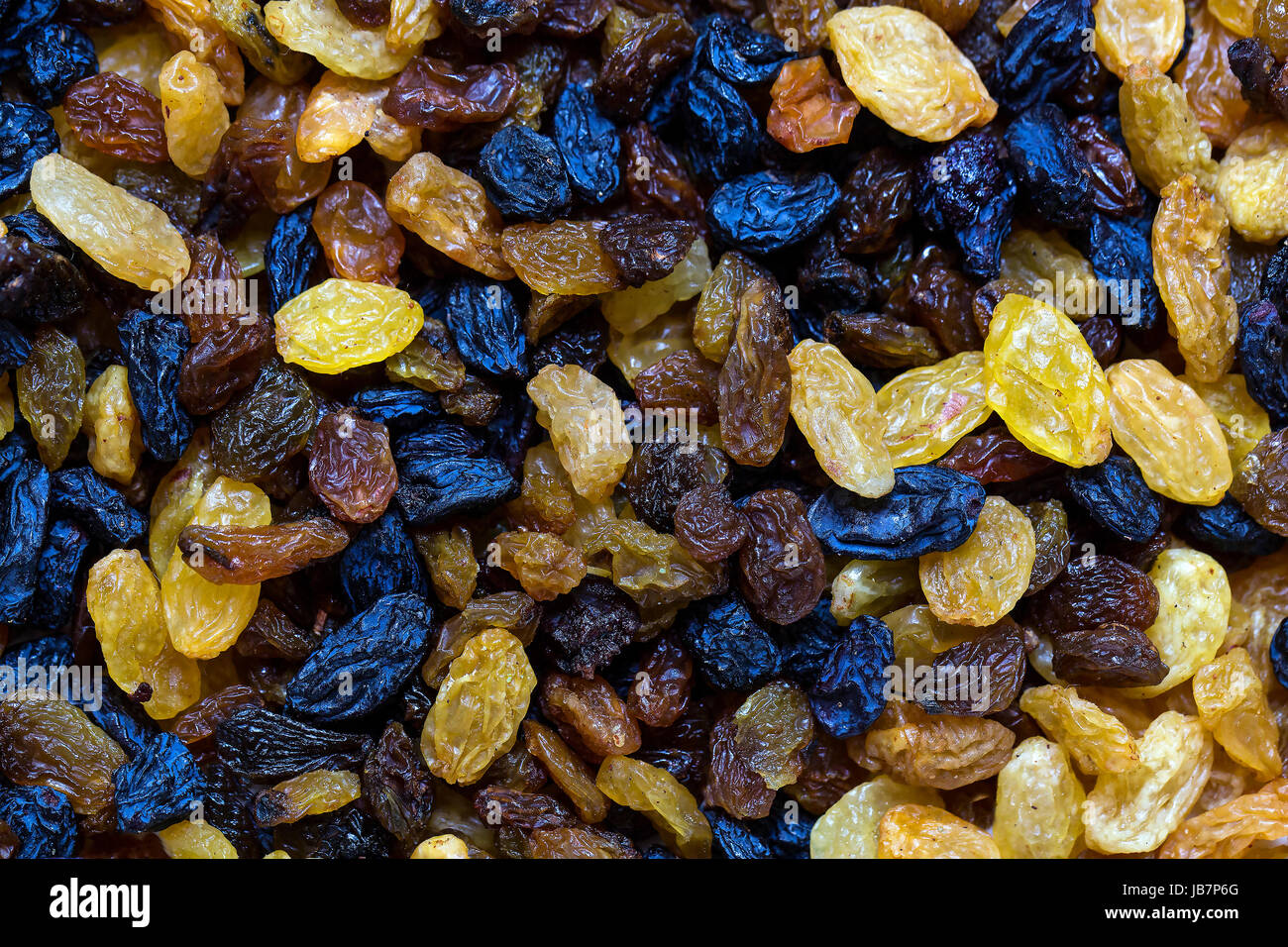 Background dried raisin grapes close up shot Stock Photo - Alamy